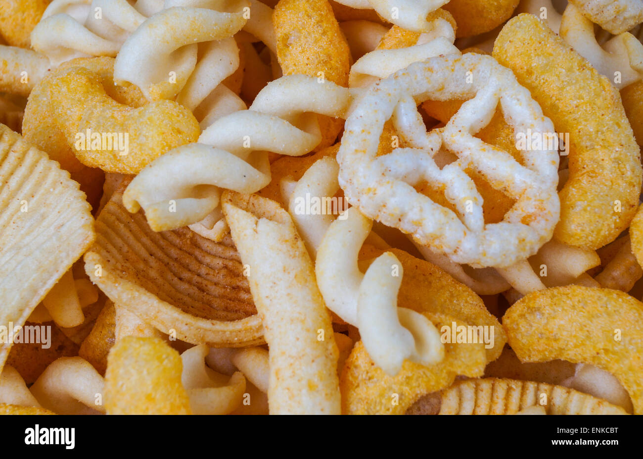 pile with a various of salty snacks Stock Photo - Alamy