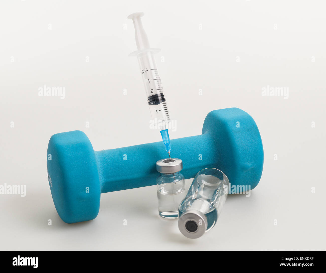 weight exercise and doping with a syringe Stock Photo - Alamy