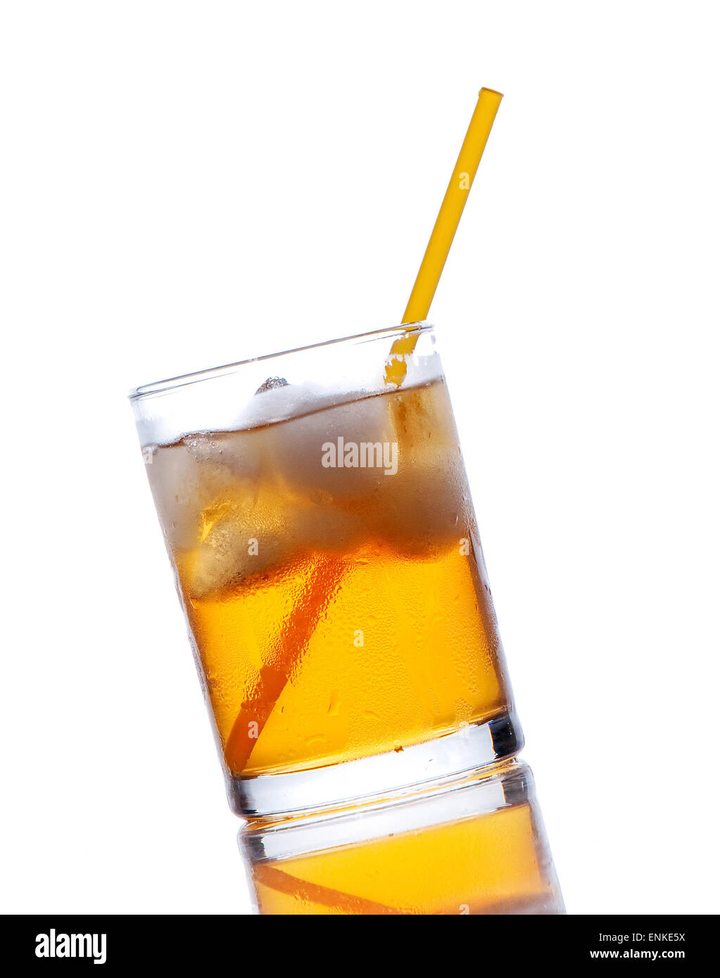 yellow drink with ice on a white background Stock Photo - Alamy