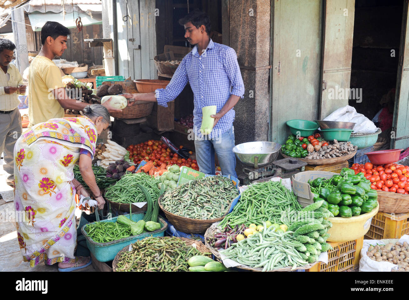 Mysore, India - 23 January 2015: Indian vendor selling vegetables to ...