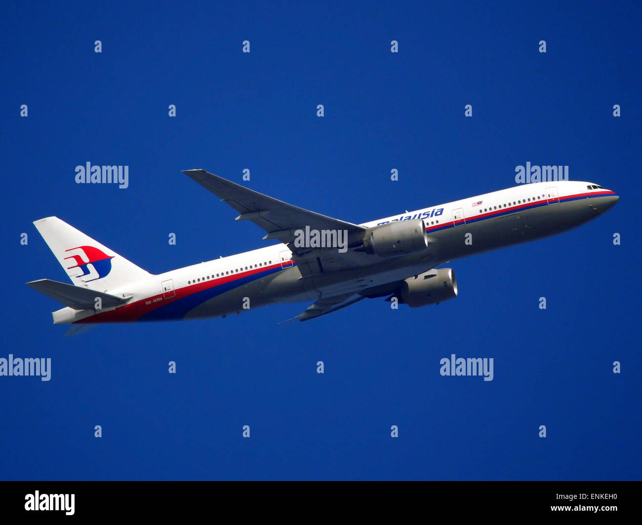Boeing 777, 9M-MRN, operated by Malaysia Airlines, is seen flying above ...