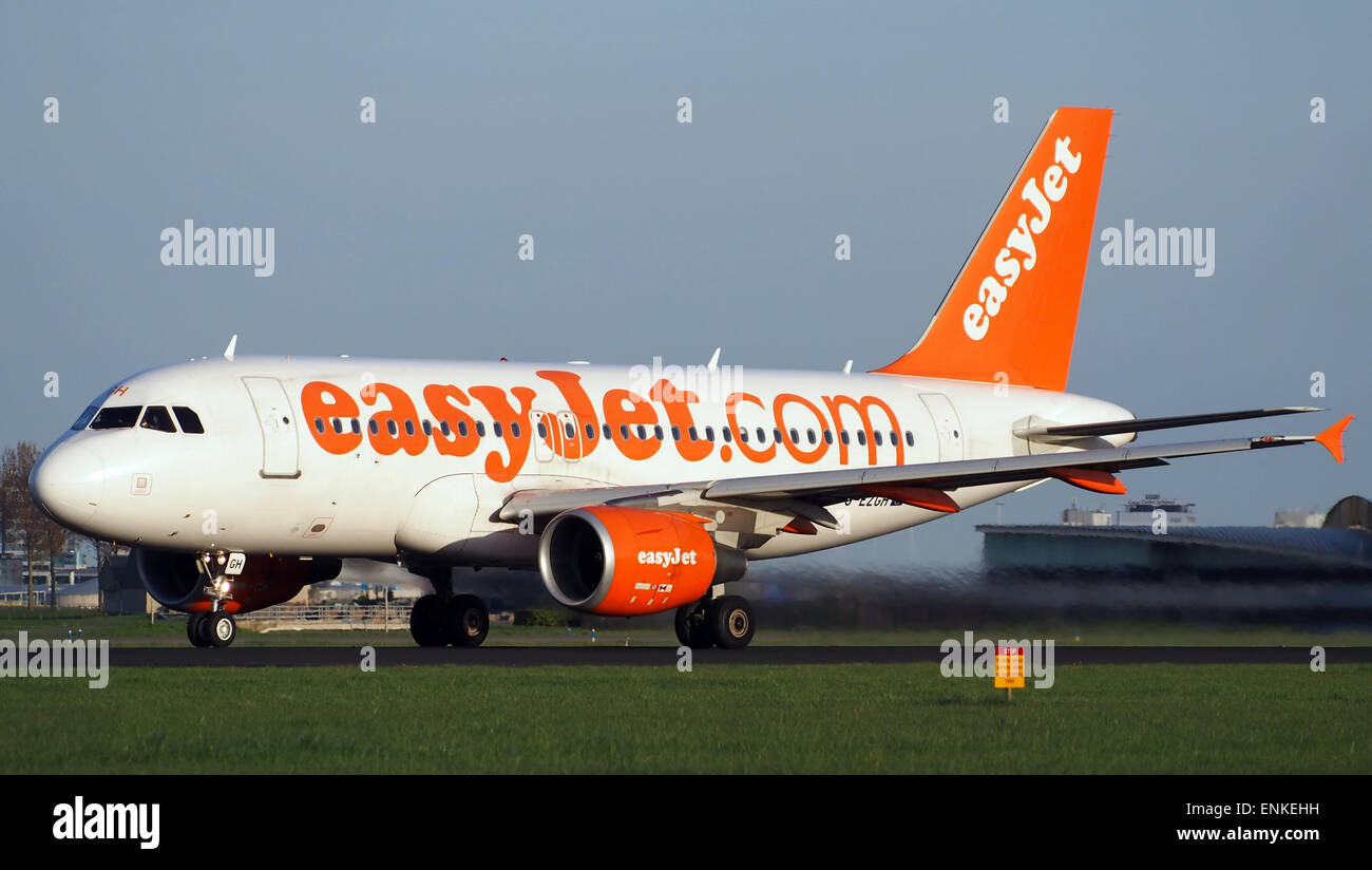 The easyJet Airbus A319-111, registration G-EZGH, takes off from ...