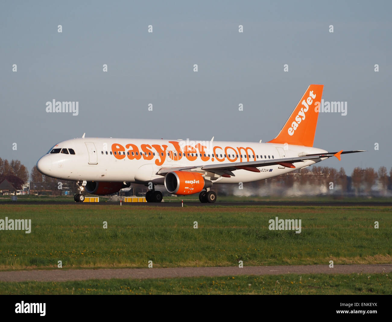 The EasyJet Airbus A320 (G-EZUH) takes off from Polderbaan at Schiphol ...