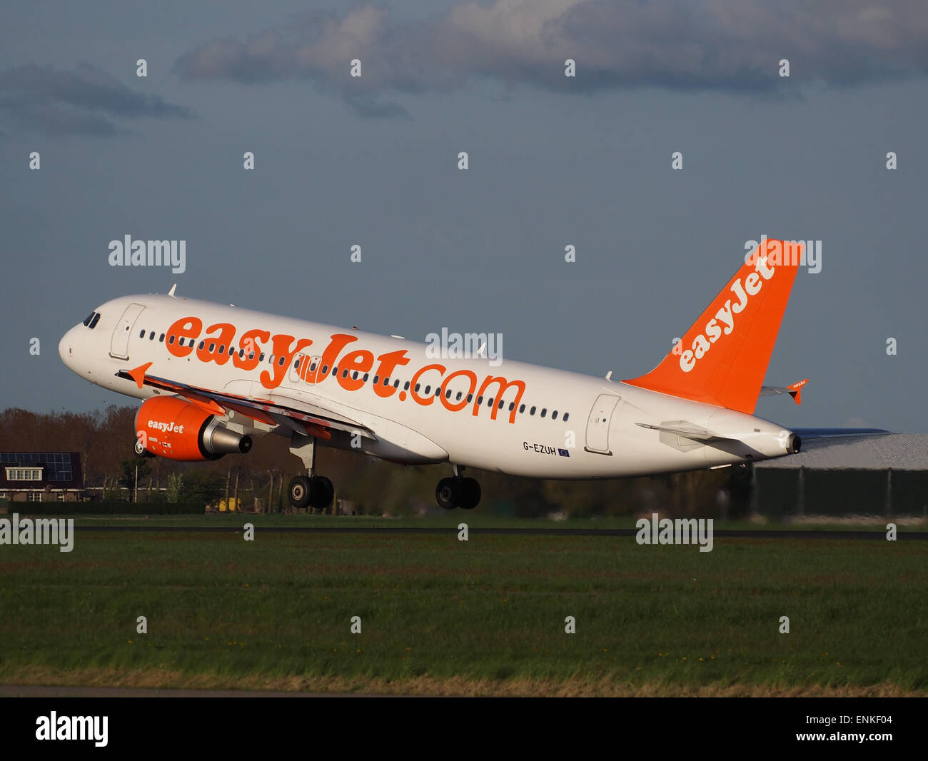Airplane takes off during sunset hi-res stock photography and images ...