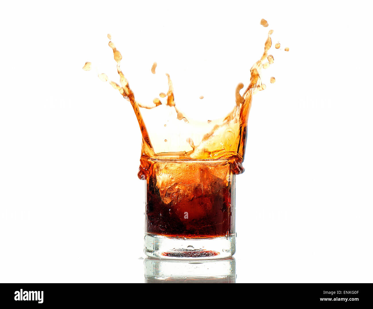 splash of cola in glass isolated on white background Stock Photo - Alamy