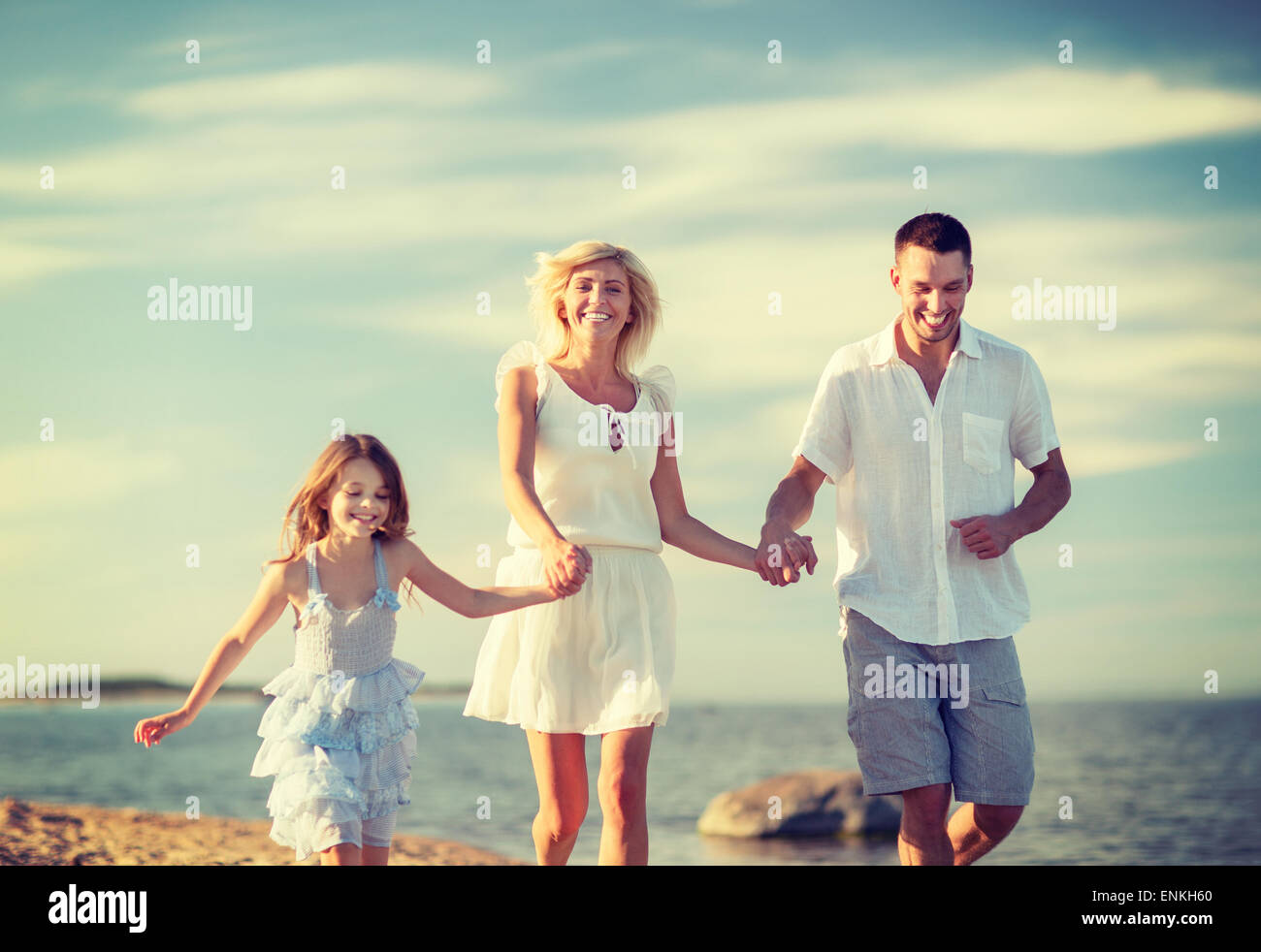 happy family at the seaside Stock Photo - Alamy