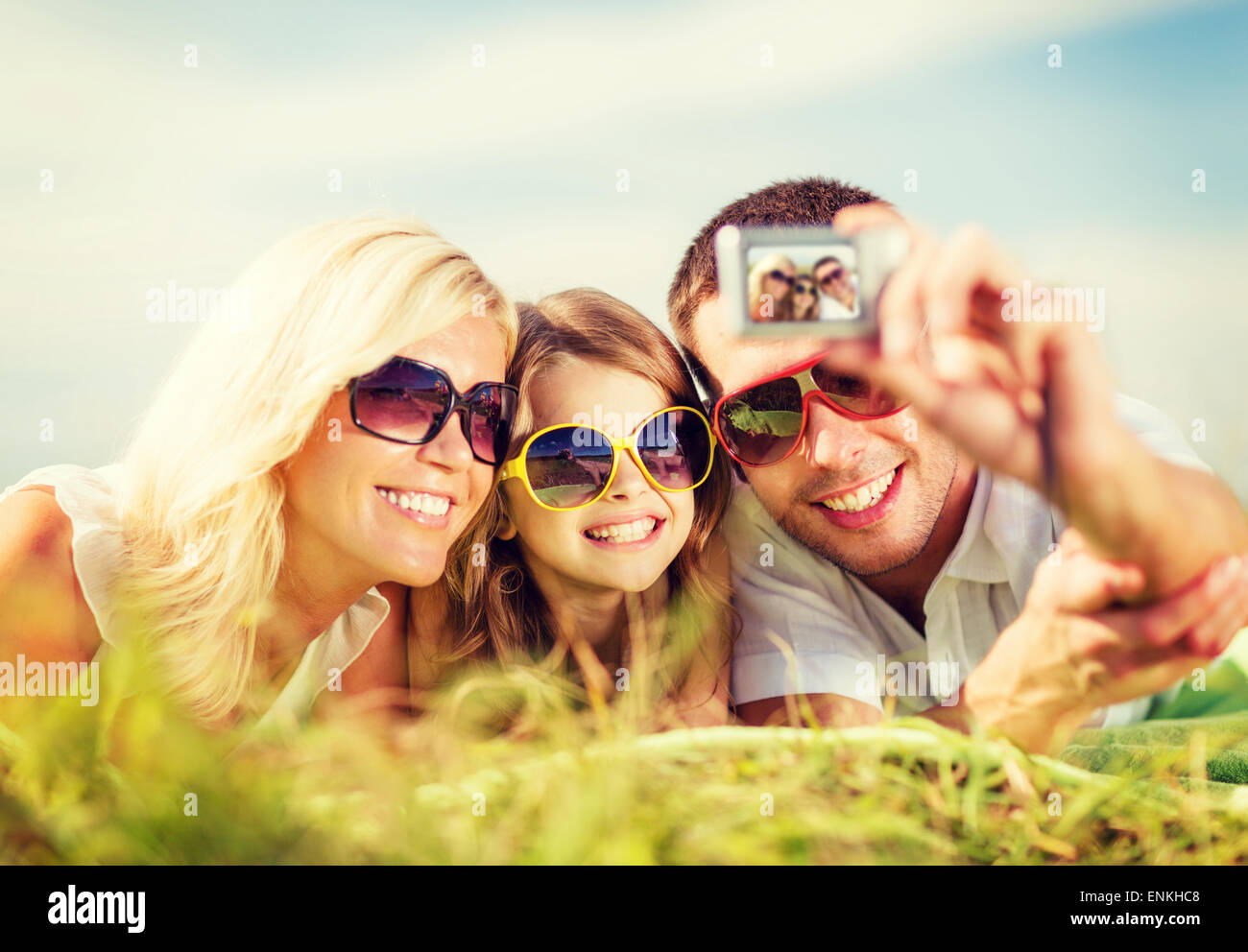 happy family with camera taking picture Stock Photo - Alamy