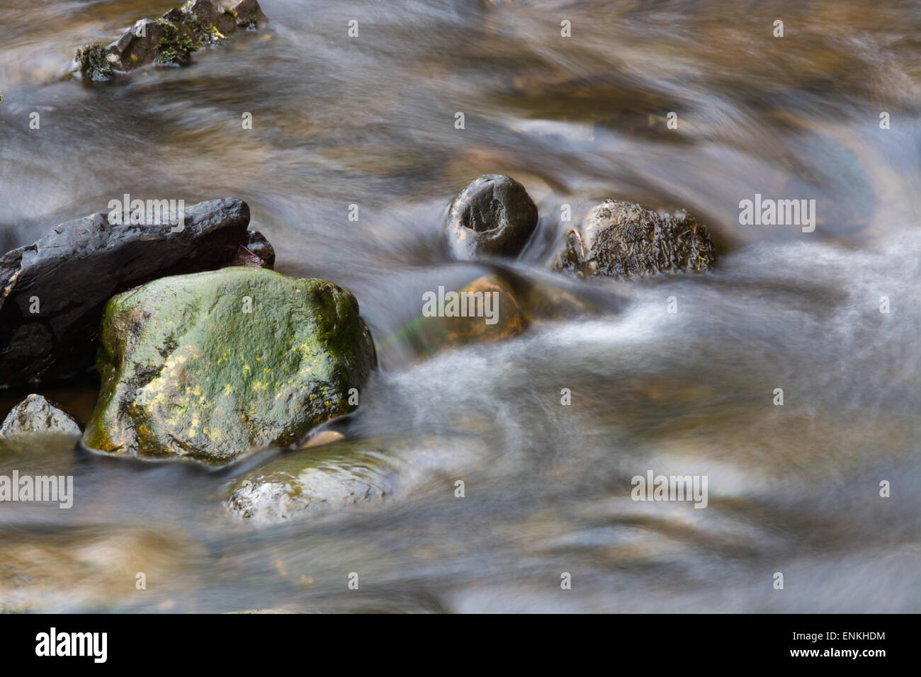 Water flowing over rocks hi-res stock photography and images - Alamy