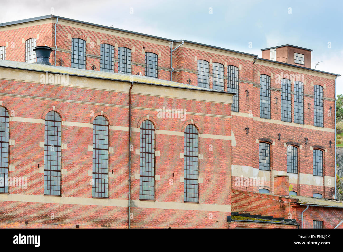 Old brick building in an industrial area Stock Photo - Alamy