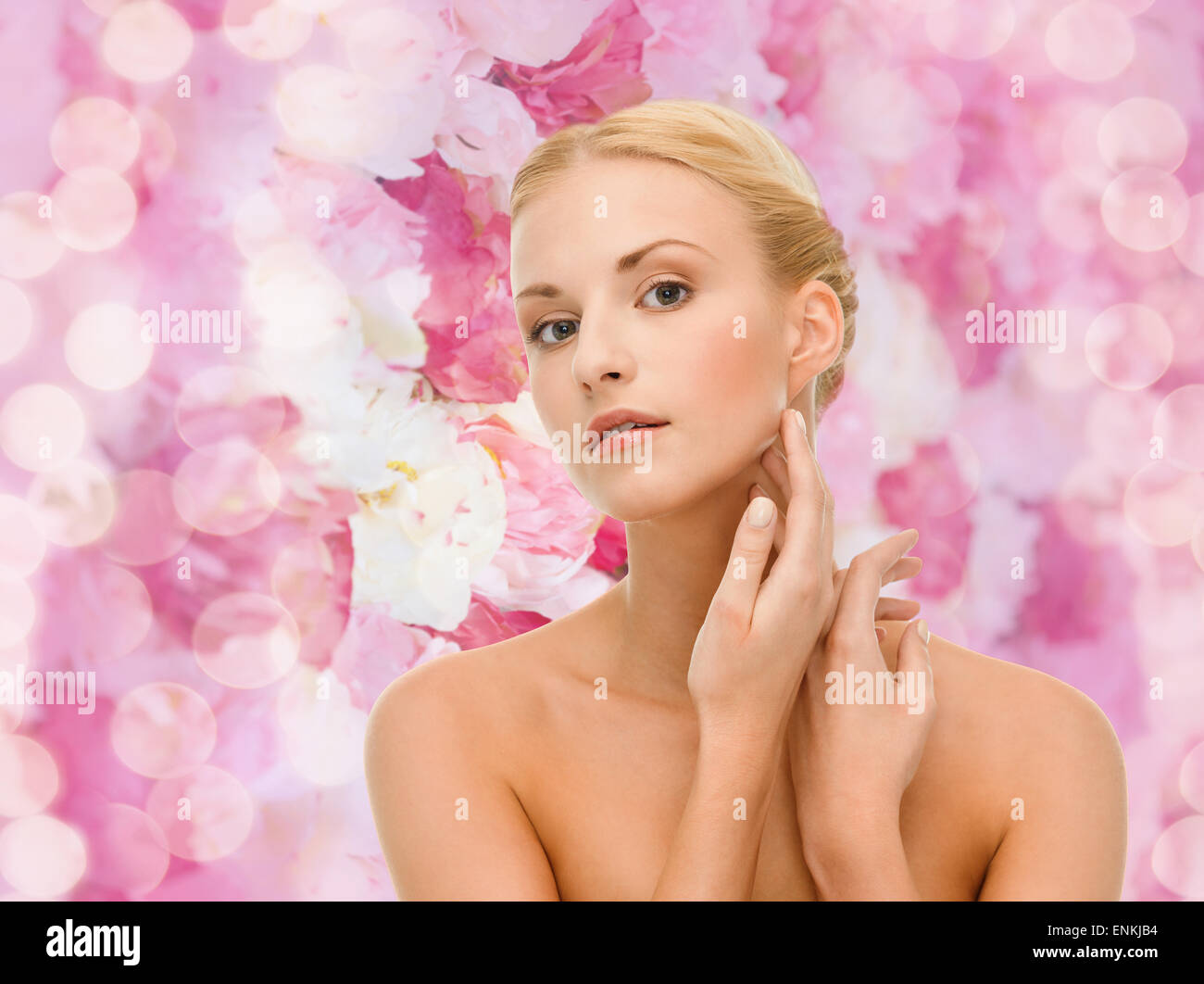 beautiful woman touching her face skin Stock Photo - Alamy