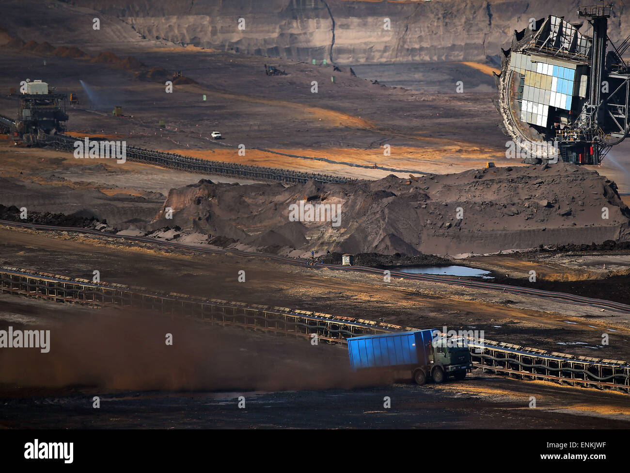 Erkelenz, Germany. 21st Apr, 2015. A lorry burrows into the earth at ...