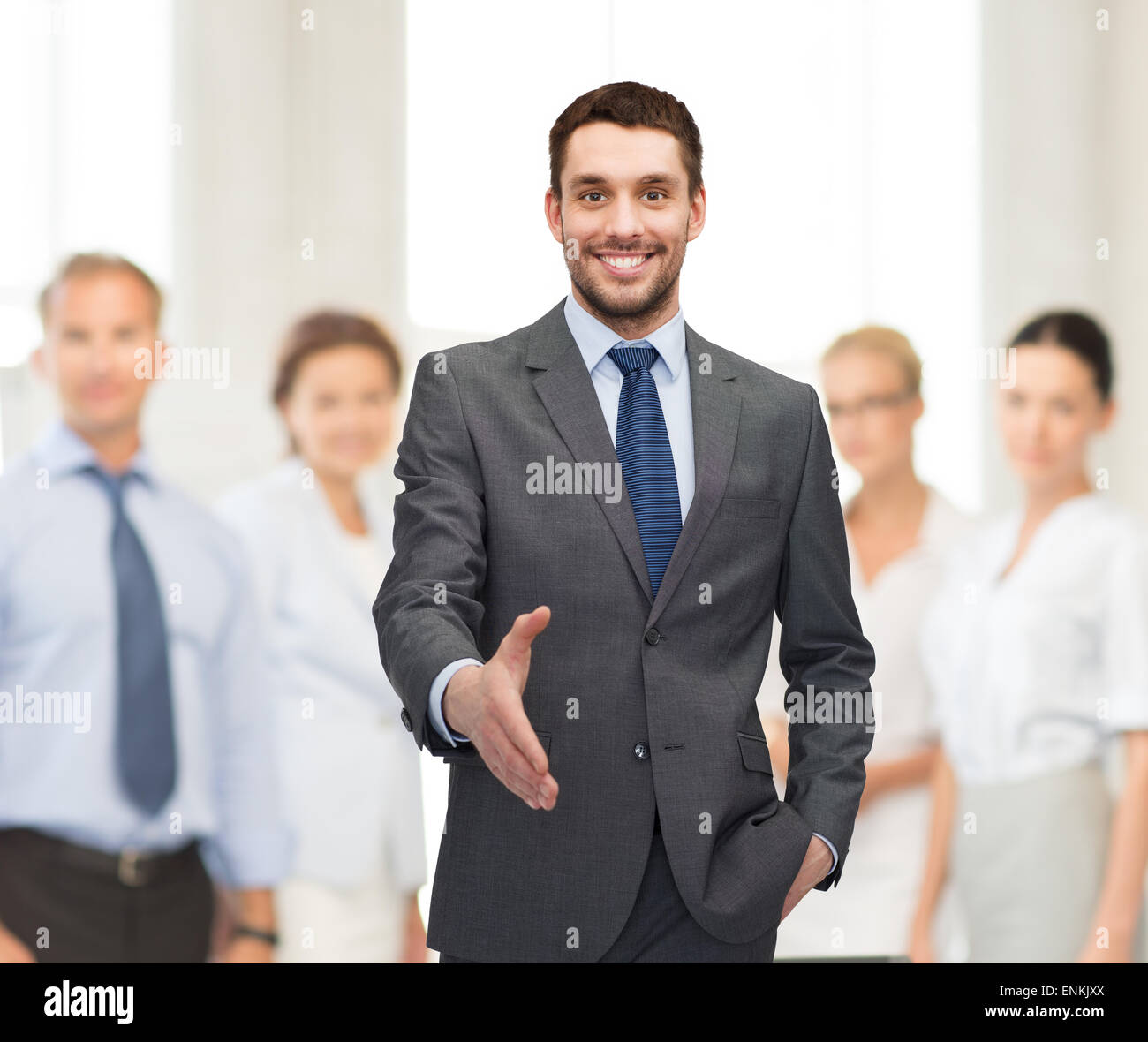 businessman with open hand ready for handshake Stock Photo - Alamy