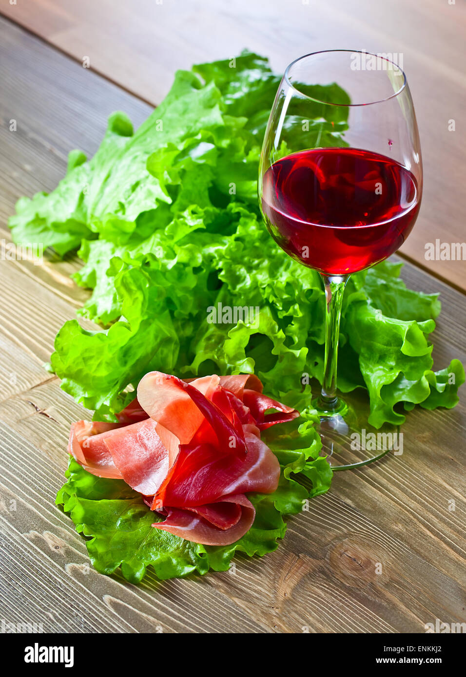 jamon and red wine on wooden table Stock Photo - Alamy