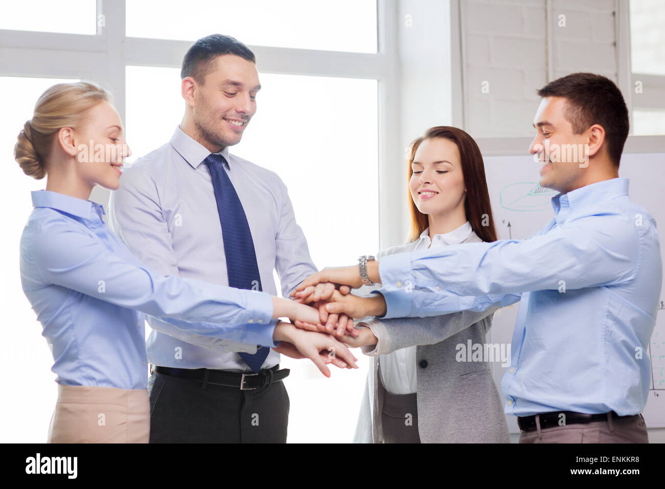 Team businessmen celebrating holding hi-res stock photography and ...
