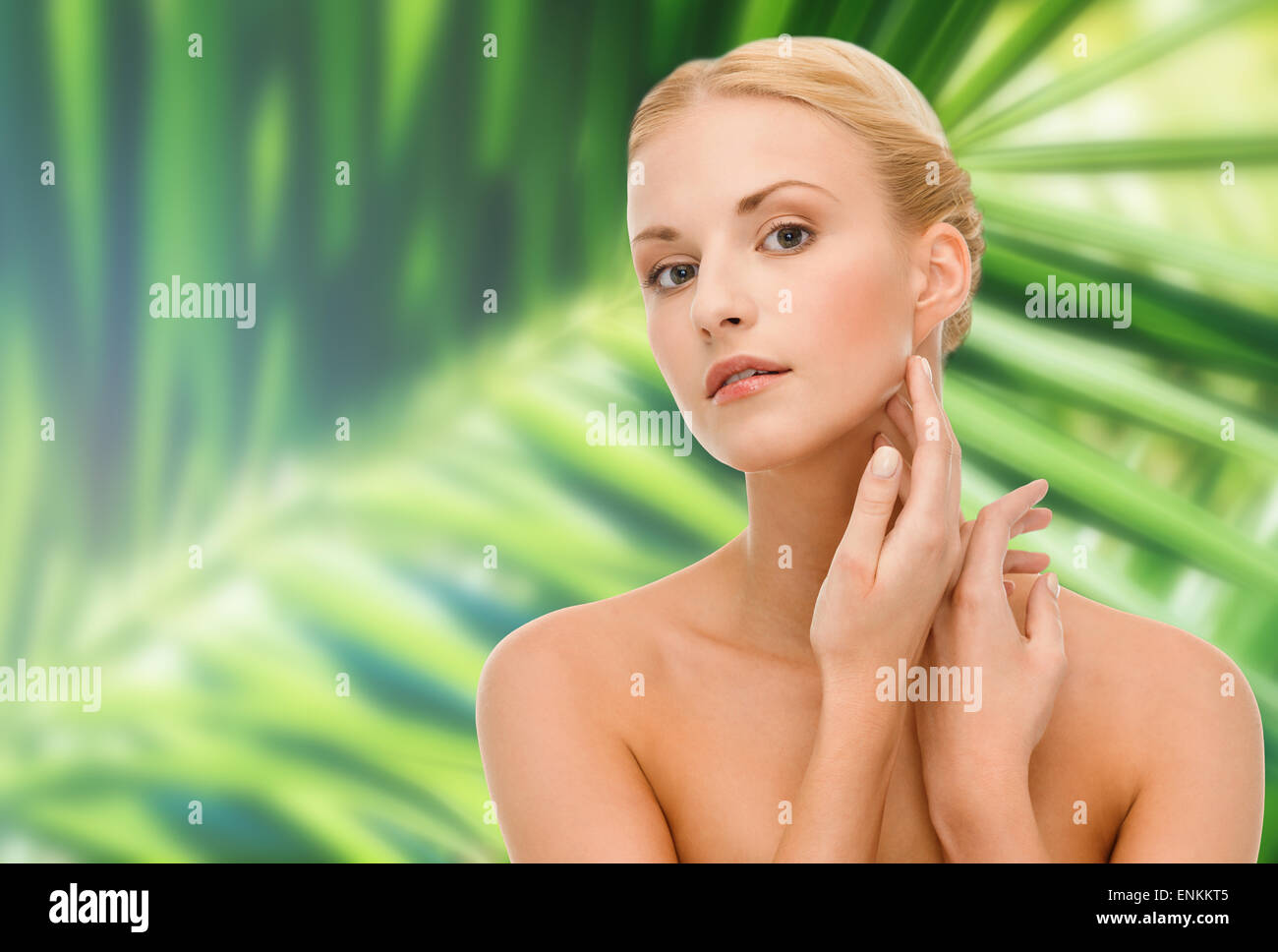 beautiful woman touching her face skin Stock Photo - Alamy