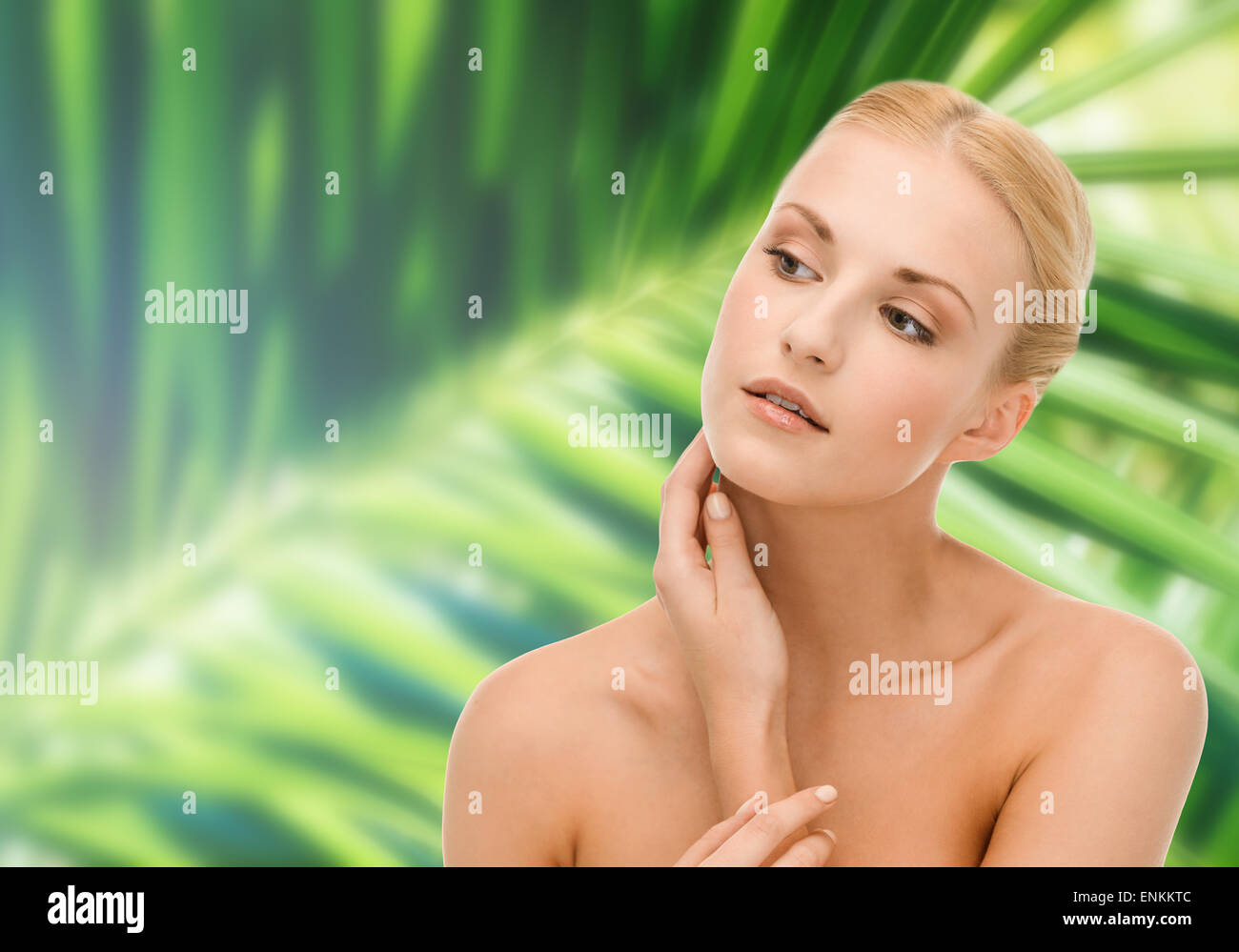 beautiful woman touching her face skin Stock Photo - Alamy