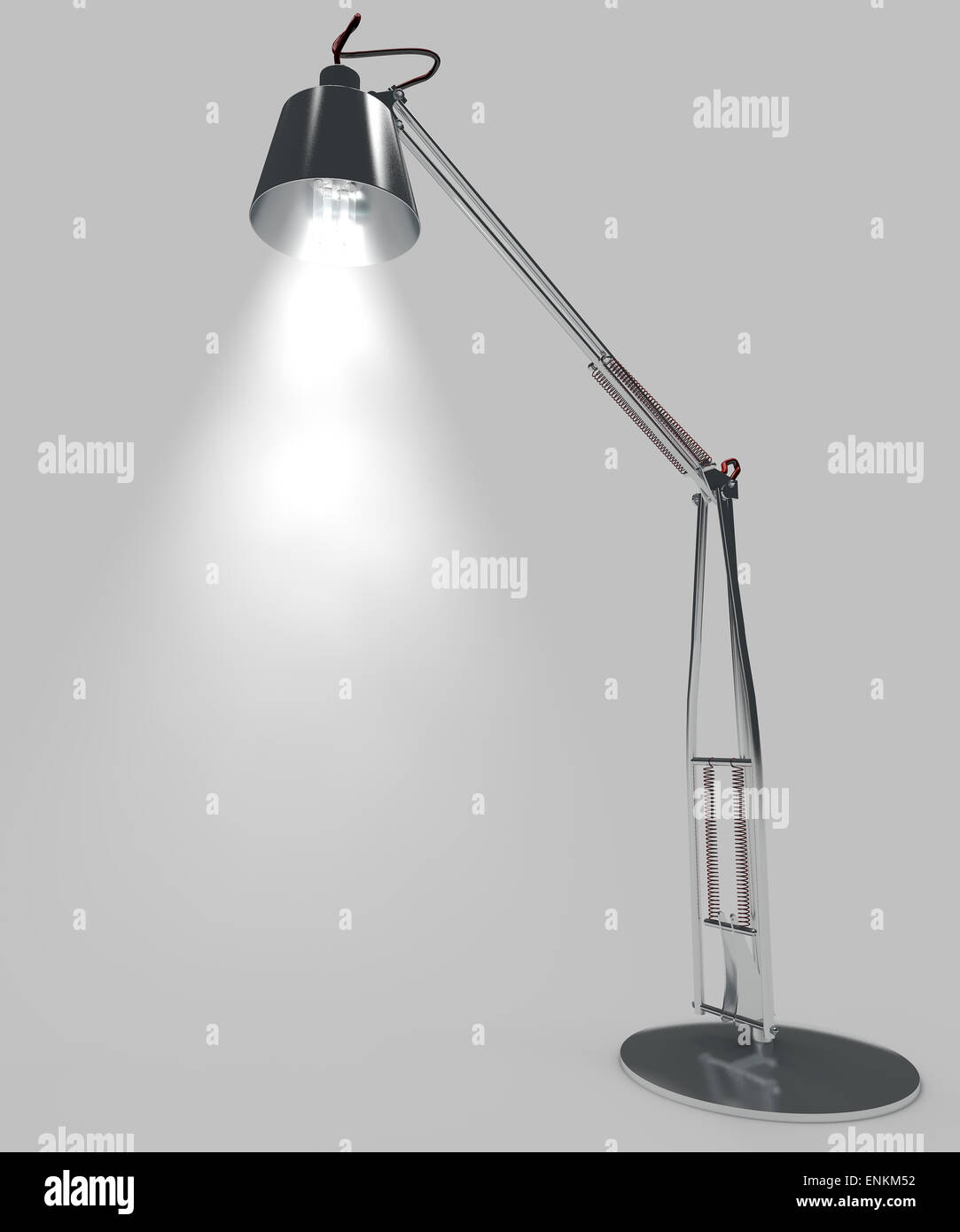 Metallic lighting desk lamp on gray background Stock Photo - Alamy