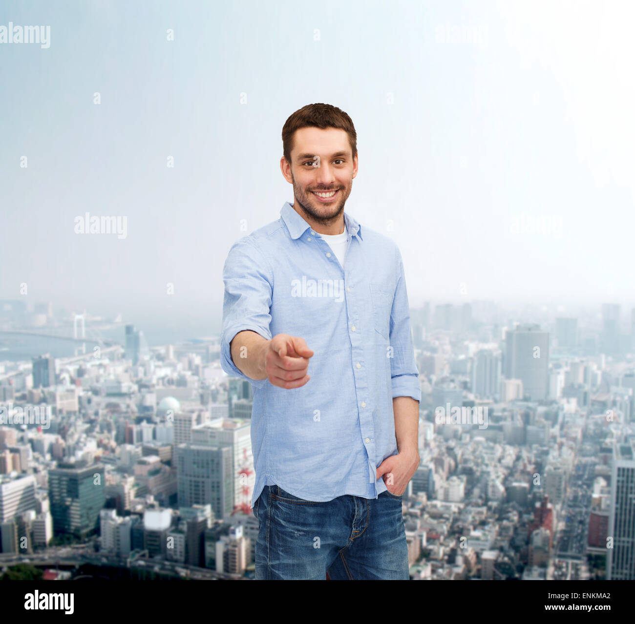 smiling man pointing finger at you Stock Photo - Alamy