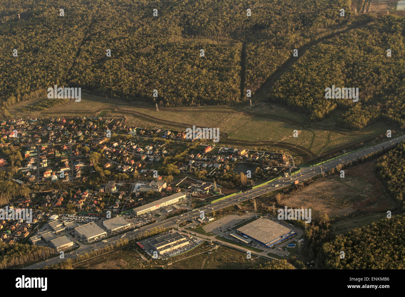 City landscape from the window an airplane at high altitude. Aerial ...