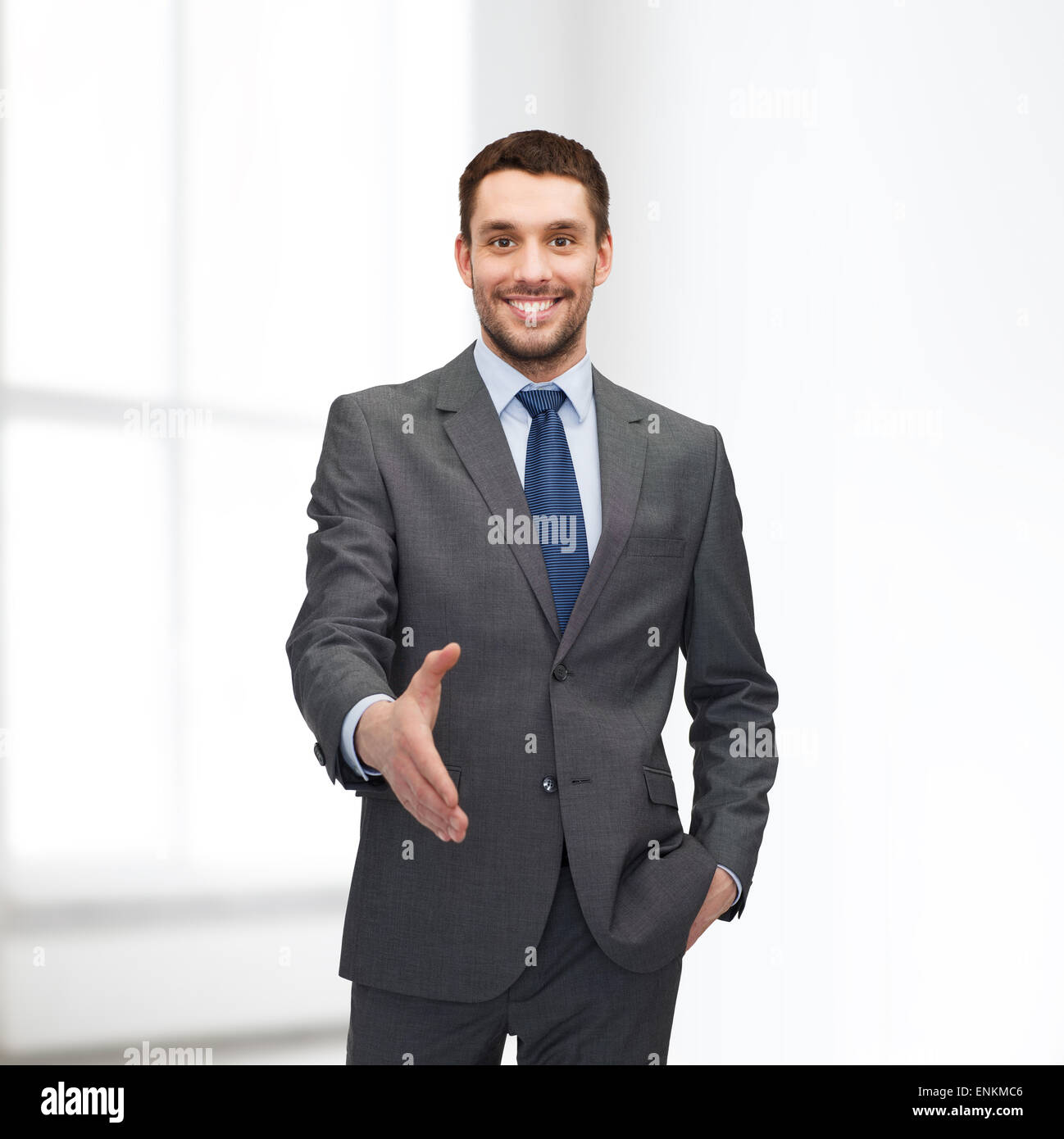 businessman with open hand ready for handshake Stock Photo - Alamy