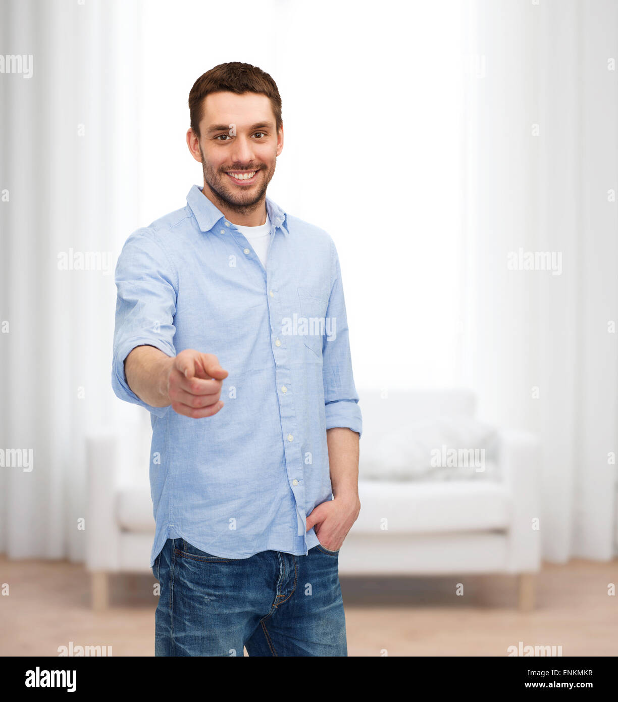 smiling man pointing finger at you Stock Photo - Alamy