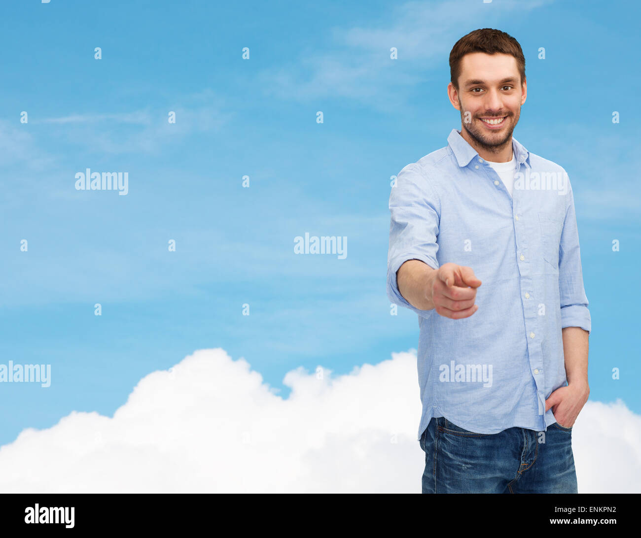 smiling man pointing finger at you Stock Photo - Alamy