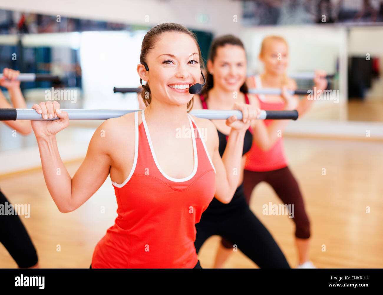 group of smiling people working out with barbells Stock Photo - Alamy