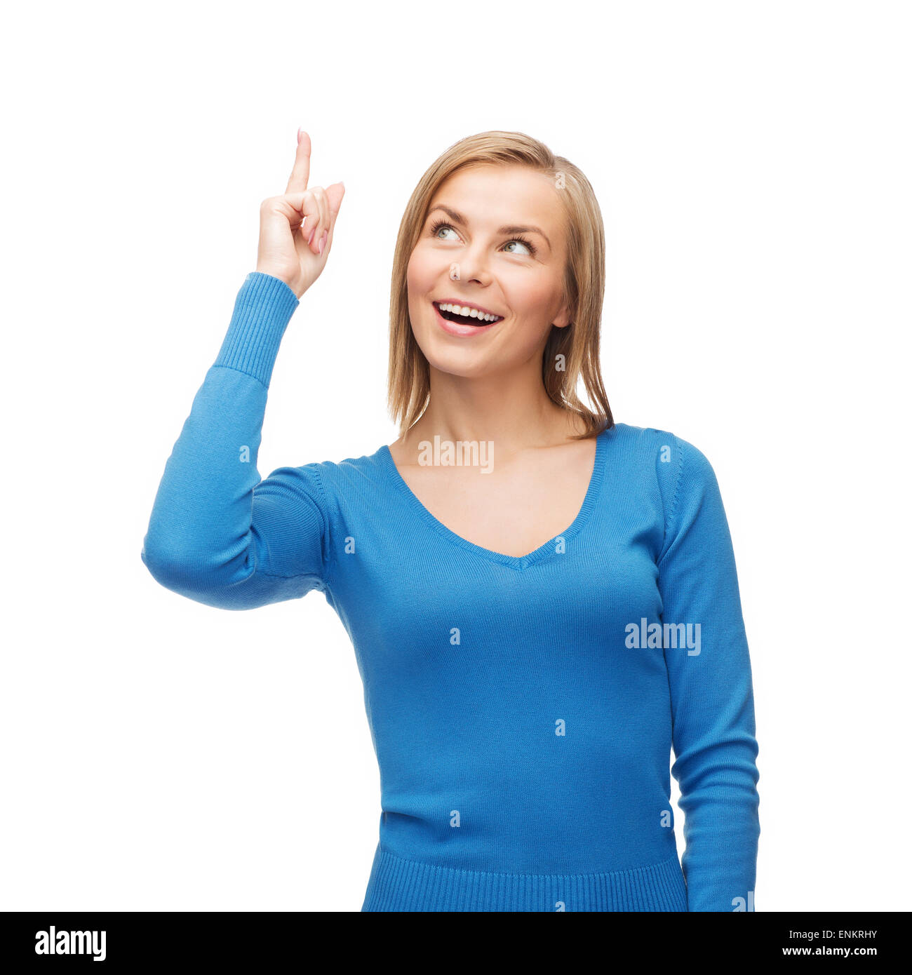 smiling woman pointing her finger up Stock Photo - Alamy