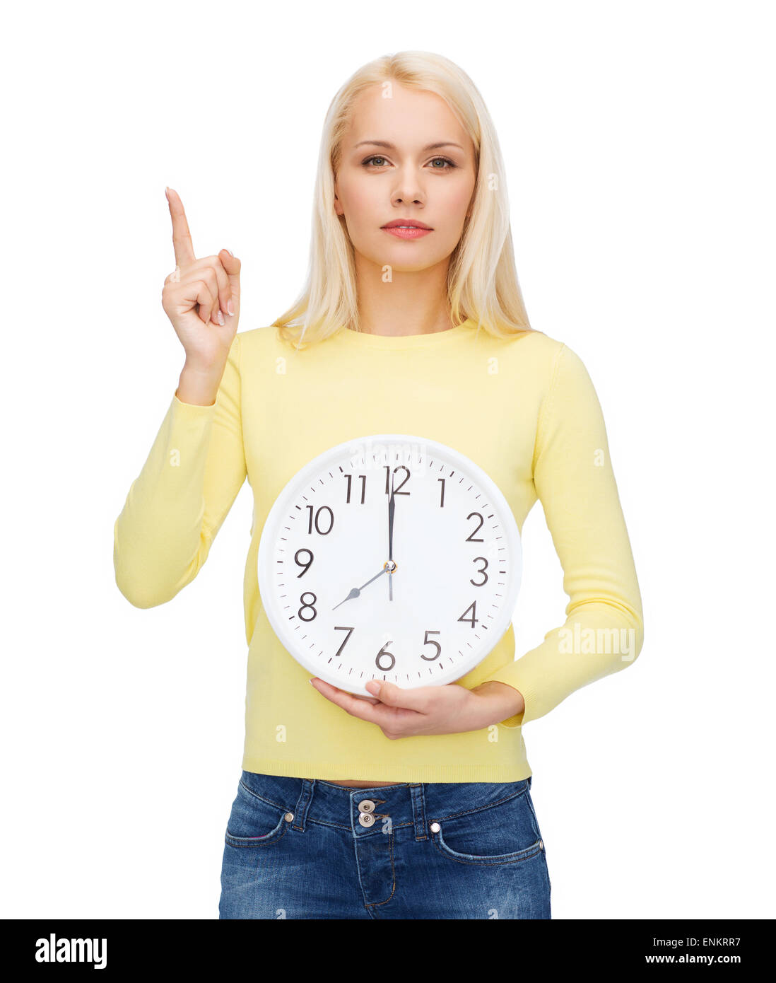 student with wall clock and finger up Stock Photo - Alamy