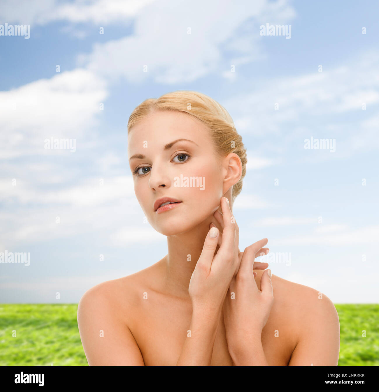 beautiful woman touching her face skin Stock Photo - Alamy