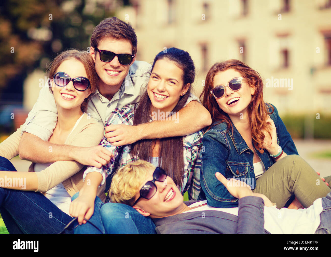 group of students or teenagers hanging out Stock Photo - Alamy