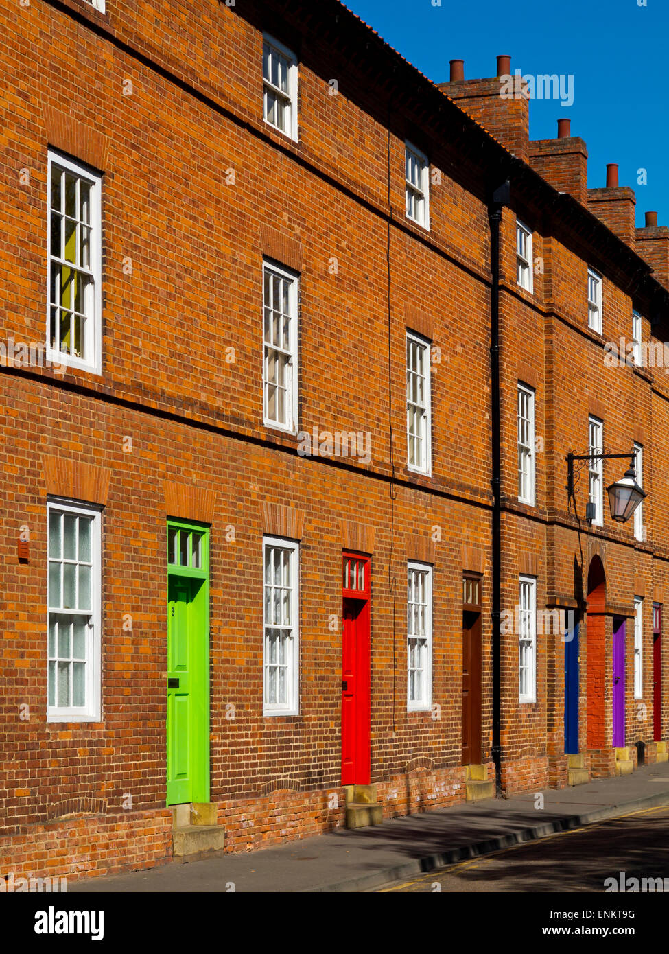 Terraced brightly coloured houses in hi-res stock photography and ...