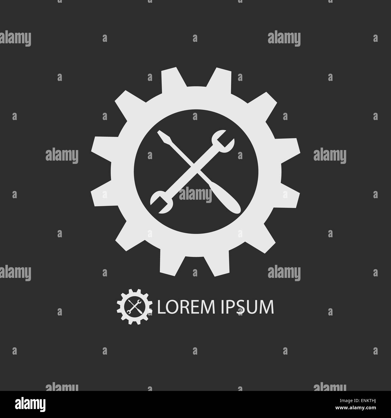 White gear wheel and tools as logo with copy space on dark grey ...