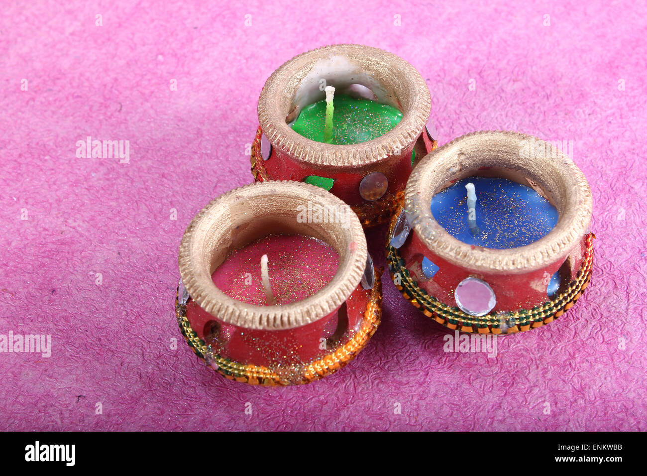 three beautifully decorated candle pot Stock Photo - Alamy