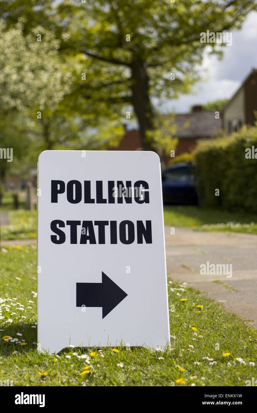 A polling station sign and grass Stock Photo - Alamy