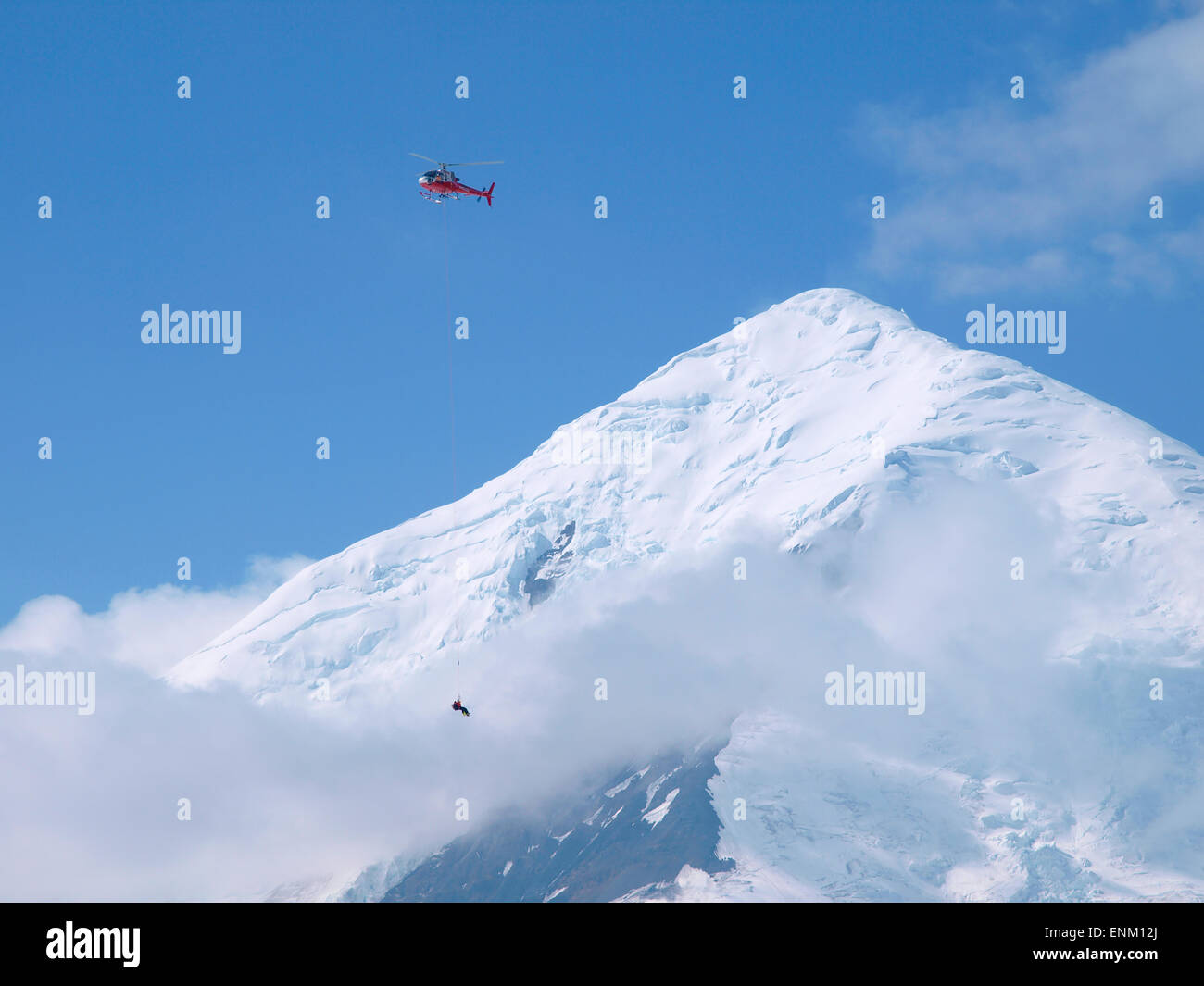 A Rescue Helicopter of the type A star is performing a longline rescue ...