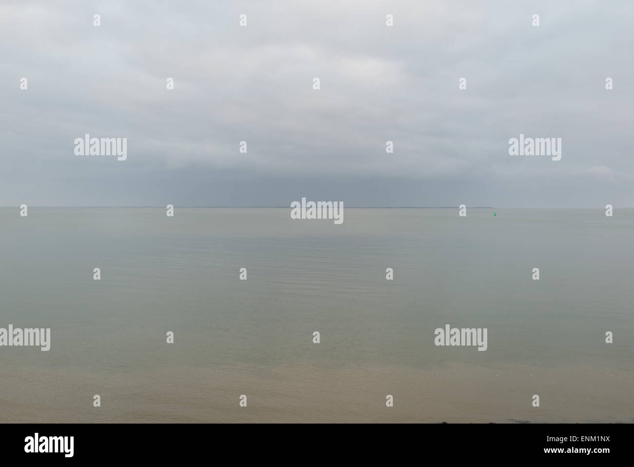 Ocean landscape with gray tones and calm sea Stock Photo - Alamy
