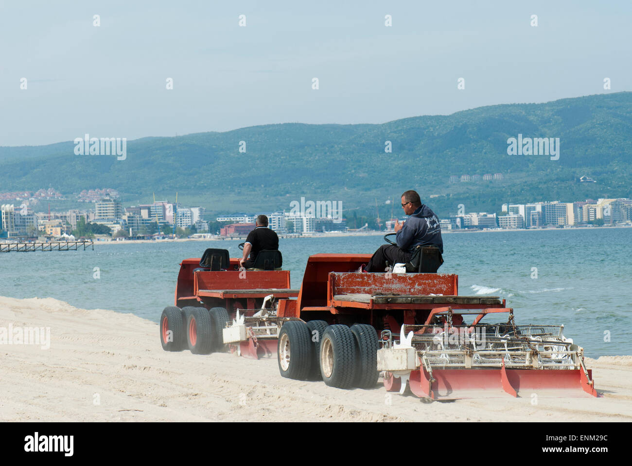 Grader on the beach Stock Photo - Alamy