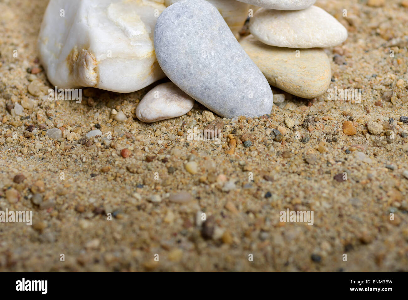 Stack of rocks an sandy background Stock Photo - Alamy