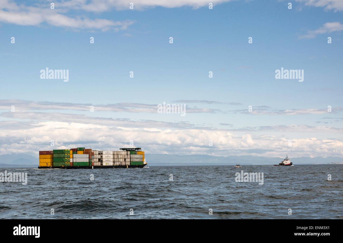 tug boat pulling barge with shipping containers, North America, Canada ...