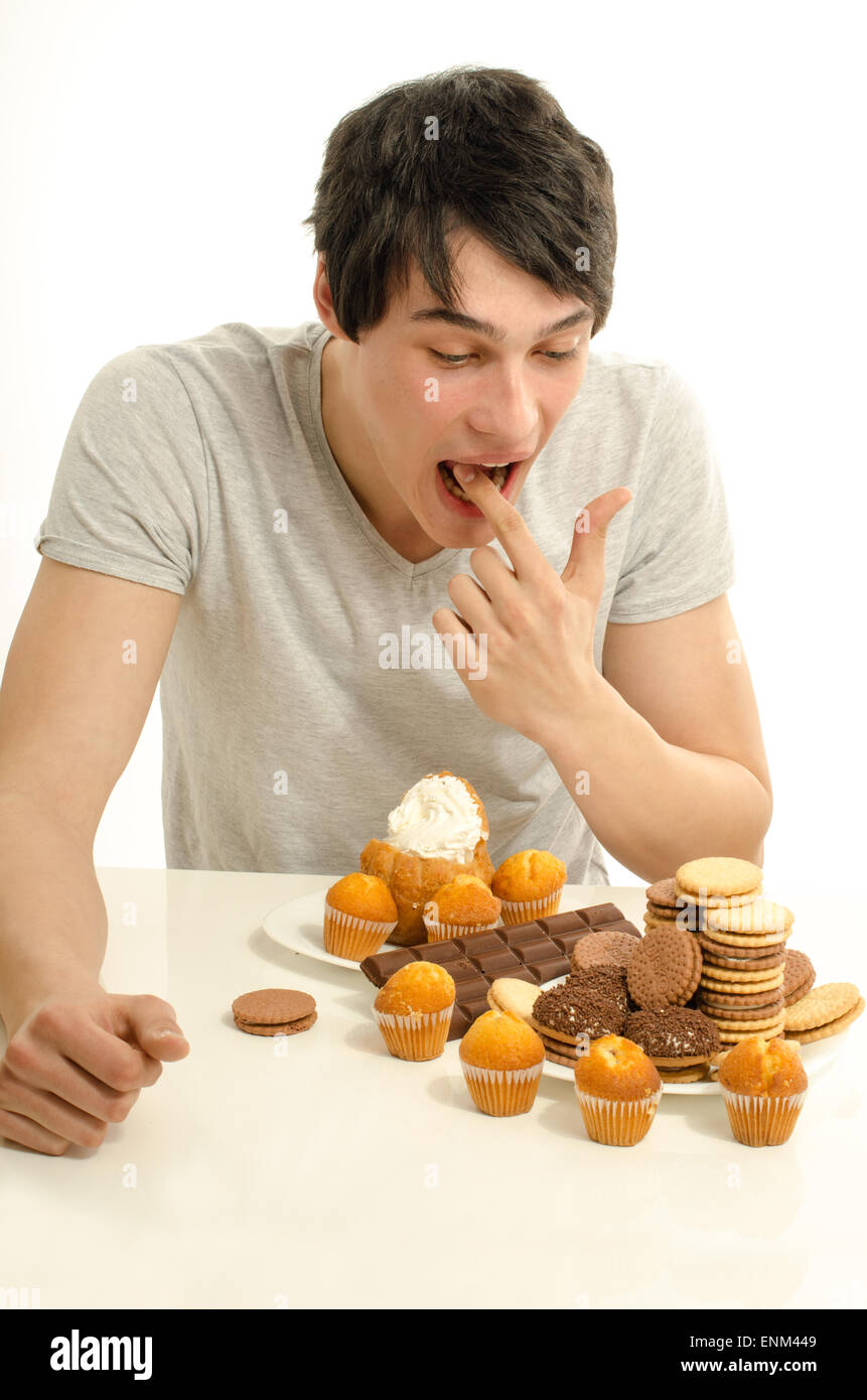 Man in love with sweets, candies,chocolate and sugar but trying to ...