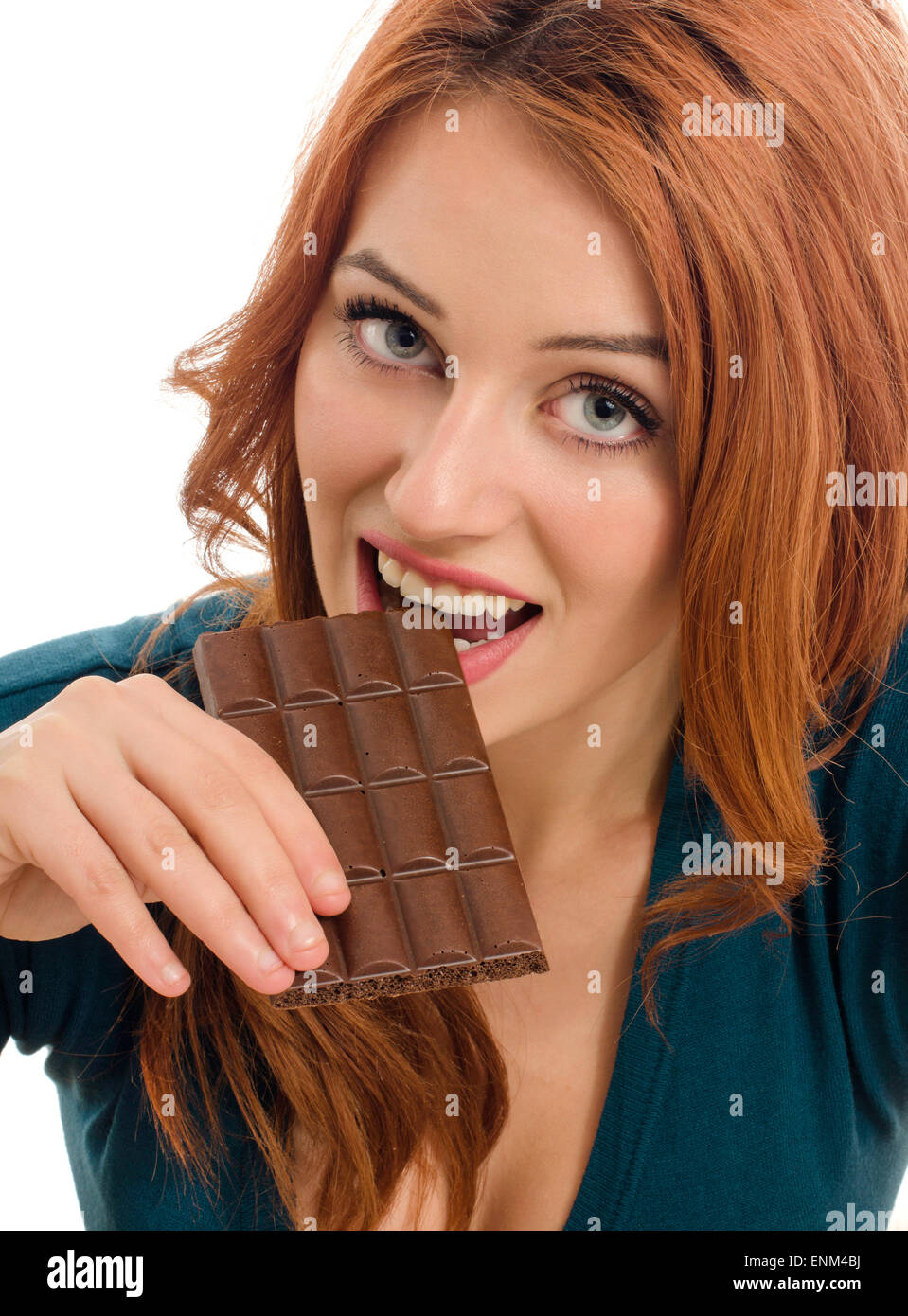 Happy woman eating a yummy chocolate and having some sugar for an ...