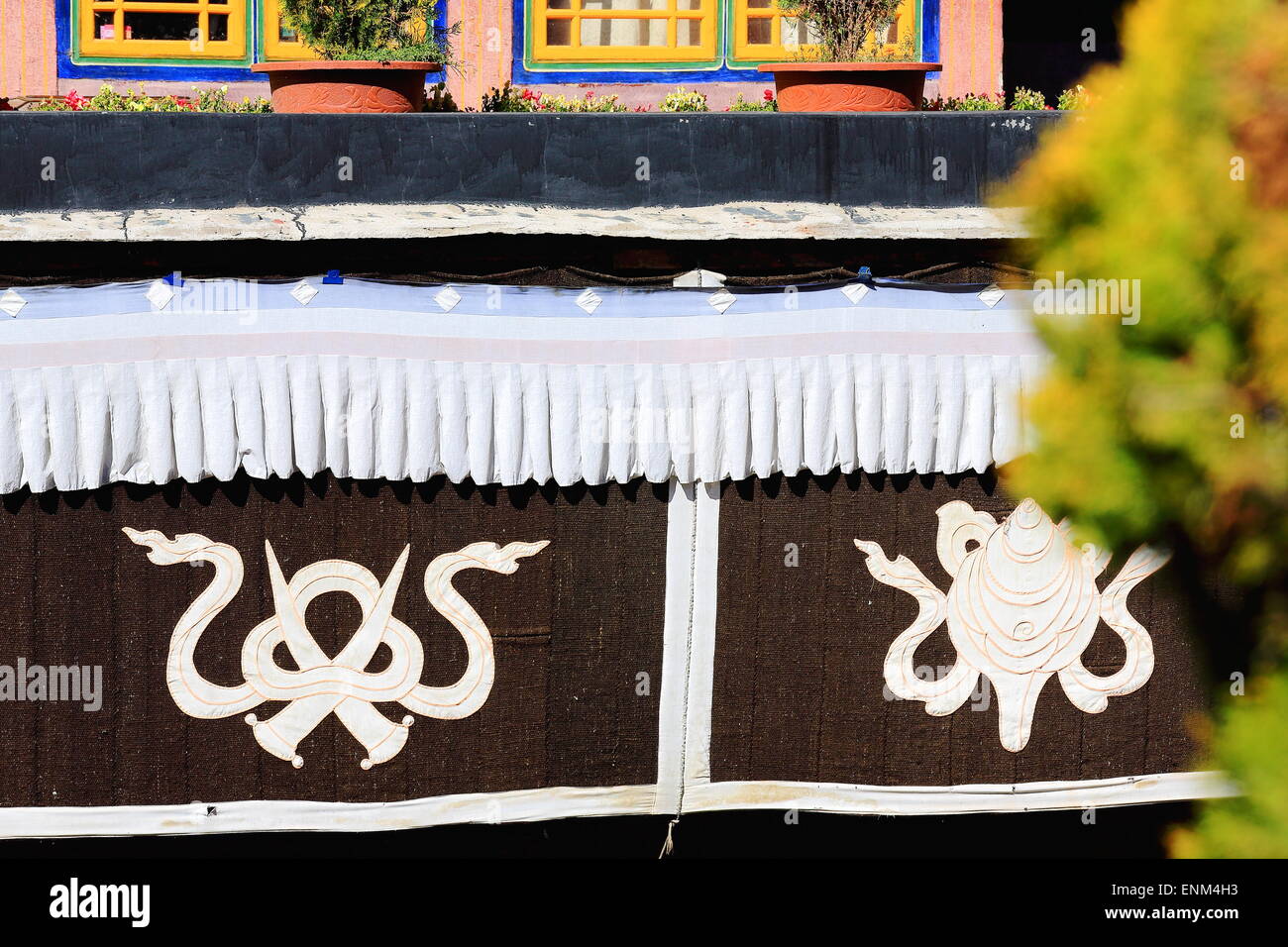 Drapery with Endless Knot and Conch Shell auspicious symbols in the ...