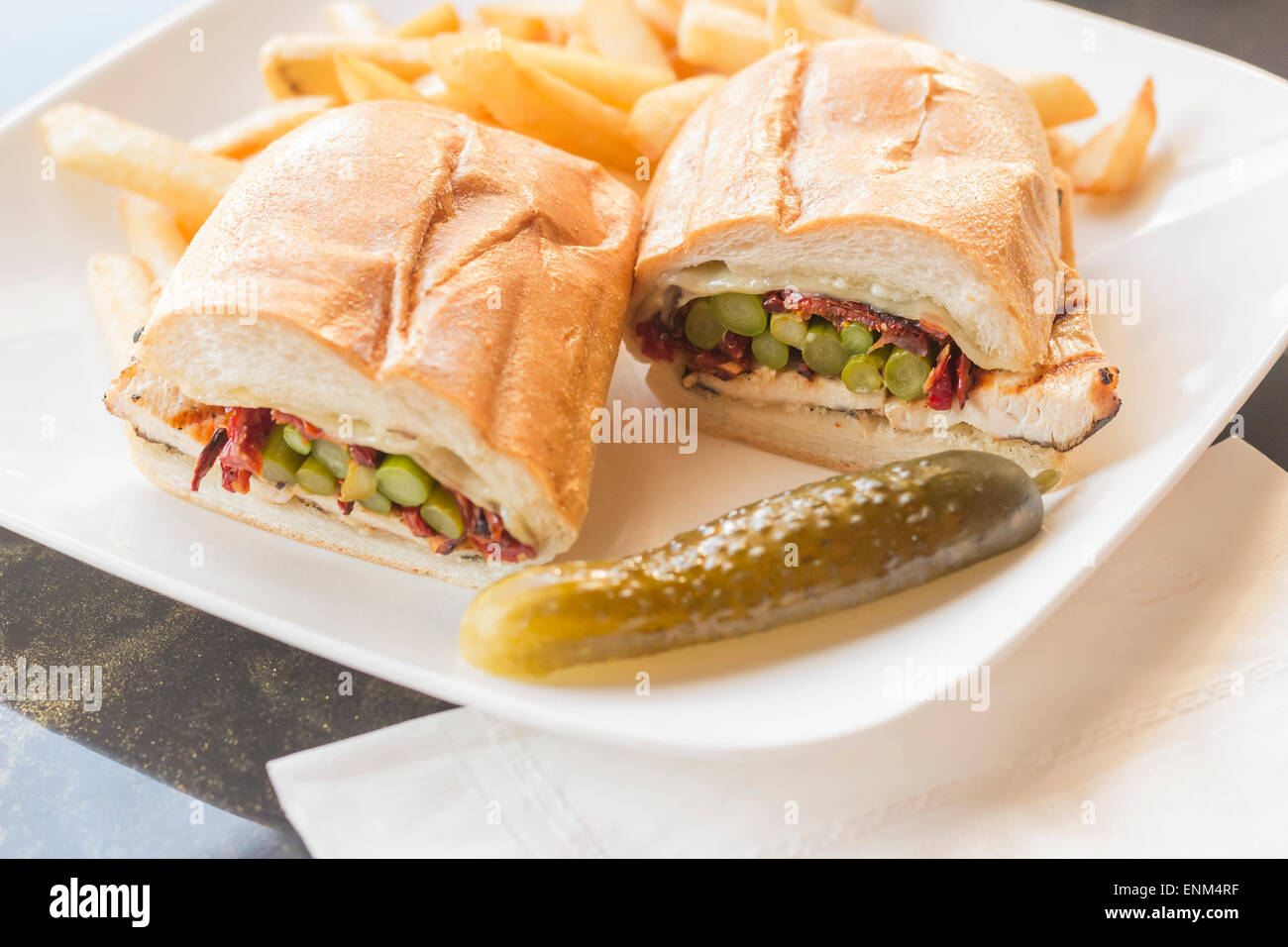Healthy and filling grilled chicken and asparagus sandwich on a torpedo ...
