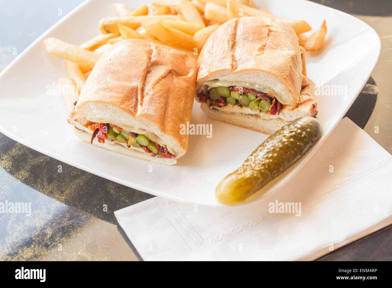 Healthy and filling grilled chicken and asparagus sandwich on a torpedo ...