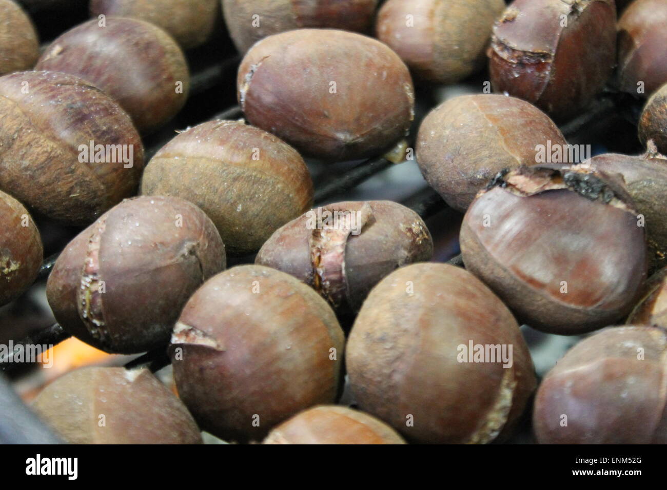 roasting chestnuts on an open fire Stock Photo - Alamy
