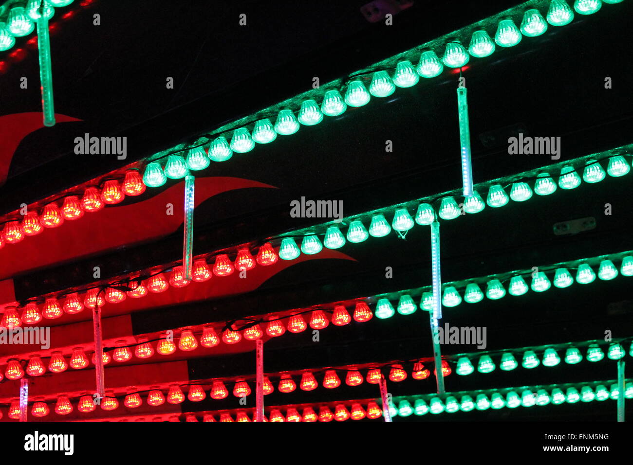 fairground funfair ride moving fast fair lights Night colours of the ...