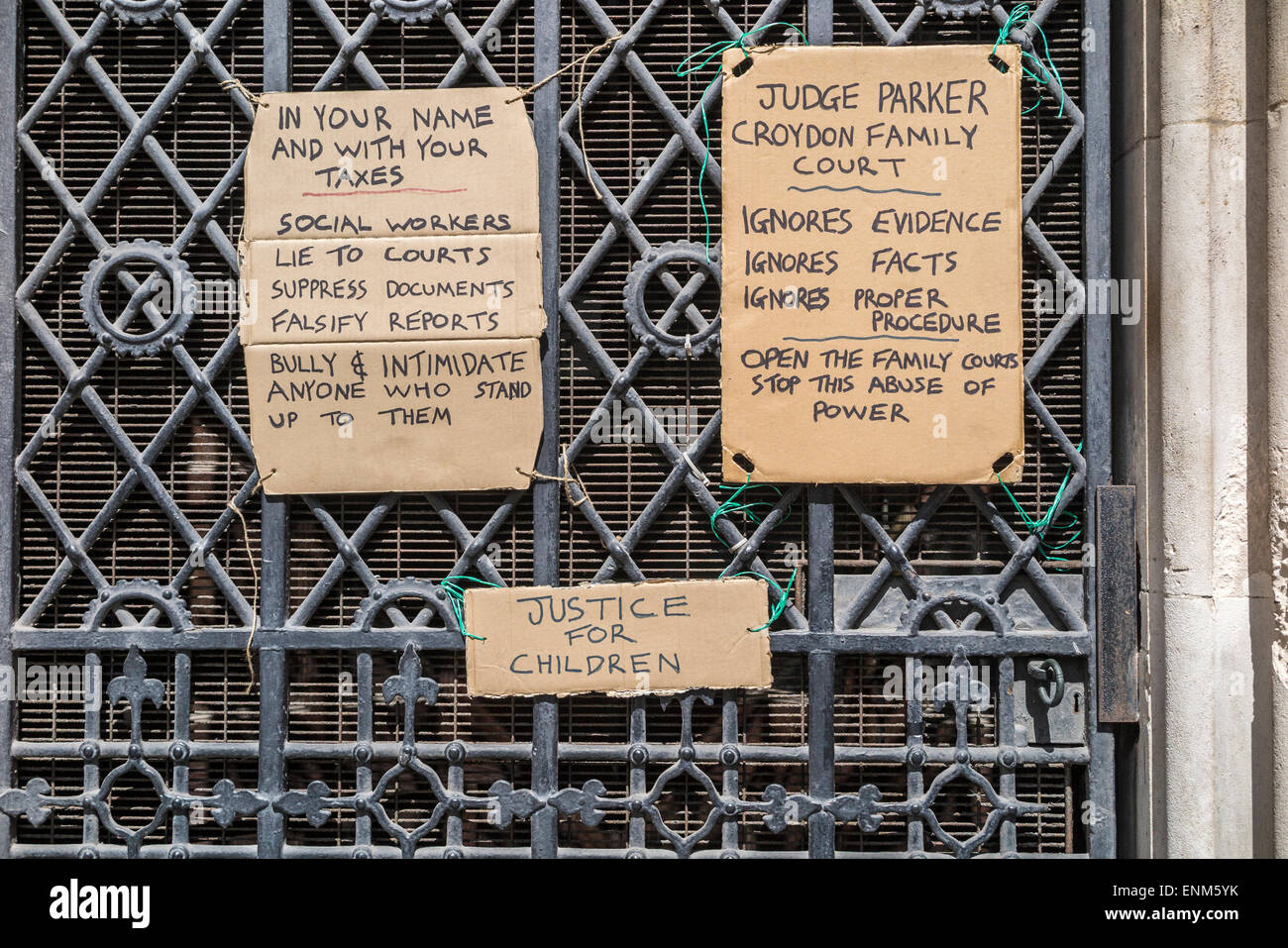 Protest placards at the Royal Courts of Justice (law courts), Strand ...
