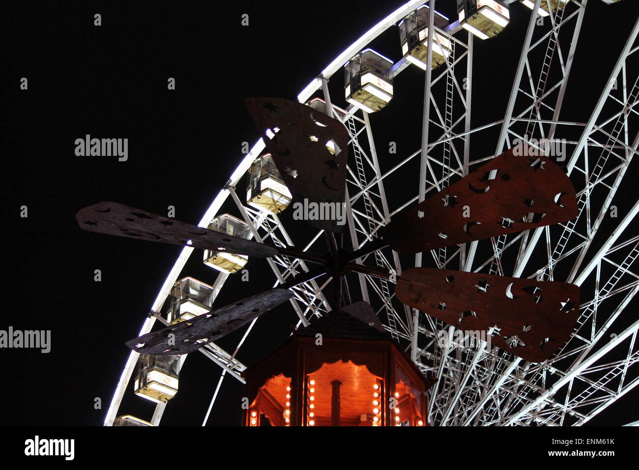 fairground funfair ride moving fast fair lights Night colours of the ...