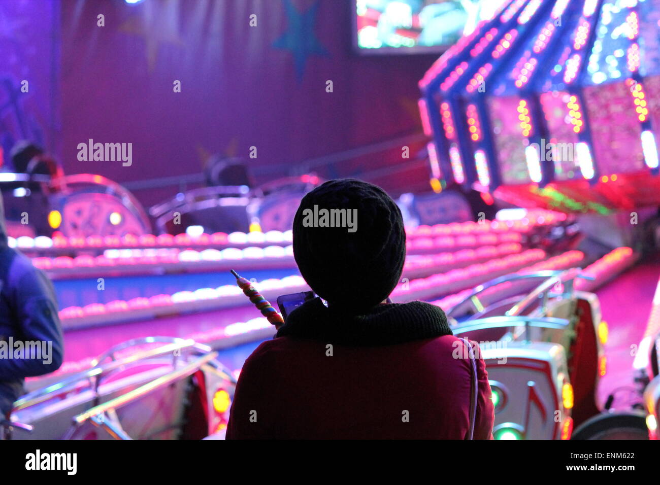 fairground funfair ride moving fast fair lights Night colours of the ...